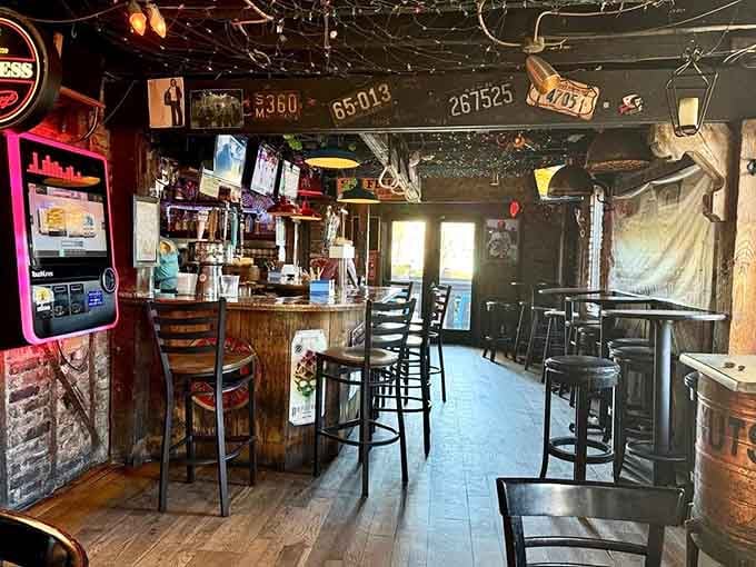 License plates dangling from the ceiling like memories, wooden floors that creak with stories, this is authenticity you can feel.