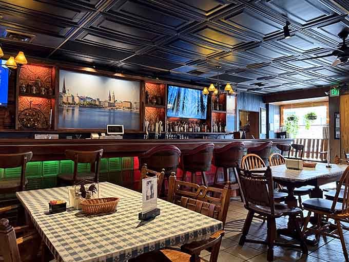 Step inside where tin ceilings meet checkered tablecloths, and suddenly you're dining in a Bavarian village with Hoosier hospitality.