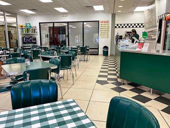 Retro checkered floors and green booths create a time machine to when diners actually cared about food.