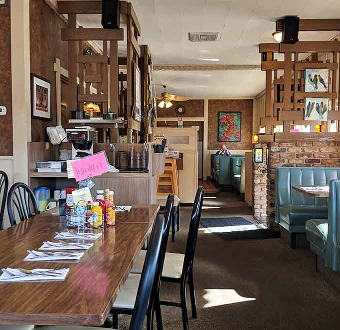 Wood paneling and turquoise booths create the kind of authentic diner atmosphere money can't buy these days.