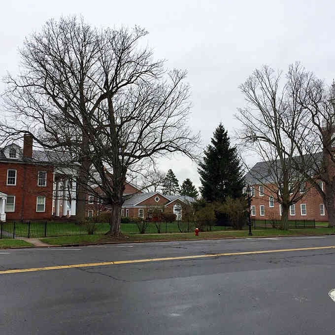 These stately homes flanking the green have witnessed more American history than most textbooks could ever capture in a single chapter.