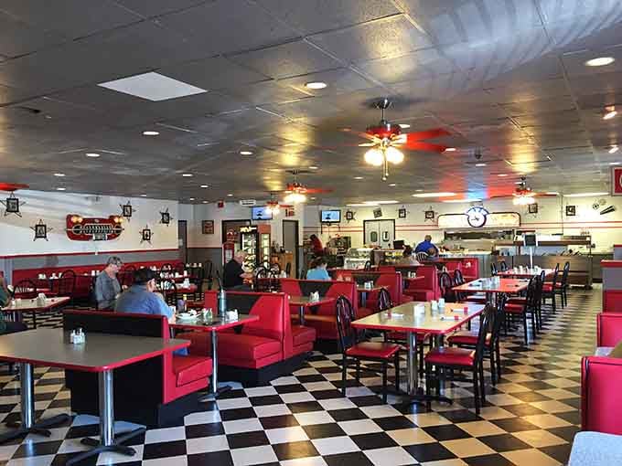 Red vinyl booths, checkered floors, and chrome accents create the perfect setting for serious comfort food consumption.