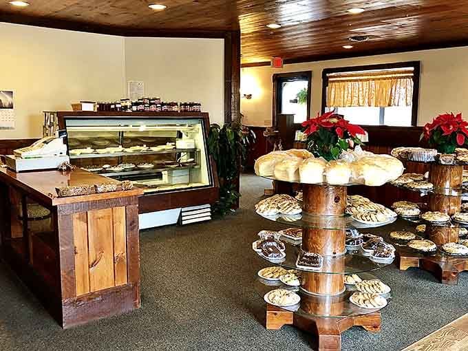 Wooden display stands showcase homemade pies like edible art, because presentation matters when you're serving pure perfection.