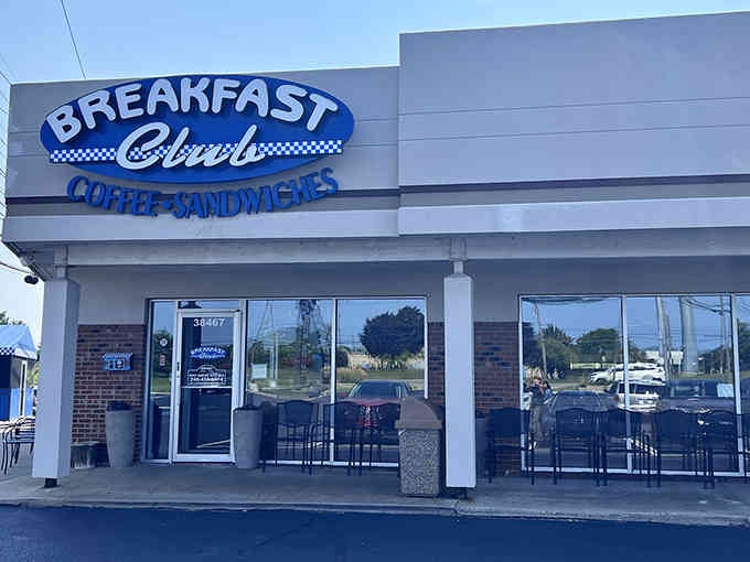 That retro checkered racing stripe brings classic diner energy to a spot dedicated to your morning happiness.
