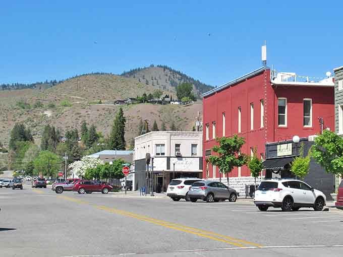 The red building pops against those hills like a postcard you'd actually want to send to someone.