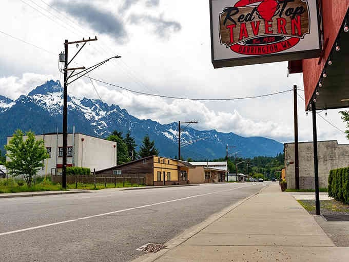 When mountains frame your main street like this, traffic jams become a distant memory you won't miss.