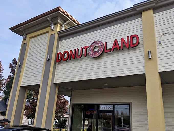 That cheerful sign beckons like a lighthouse for donut lovers, guiding you safely to sugary shores in Tualatin.