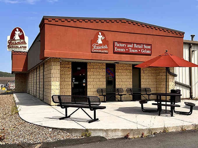 The red umbrellas outside Fascia's invite you to sit and savor chocolate under blue skies—gelato too!
