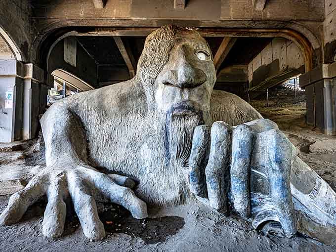 Seattle's grumpiest resident lives under a bridge, clutching a Volkswagen like it's his favorite toy from childhood.