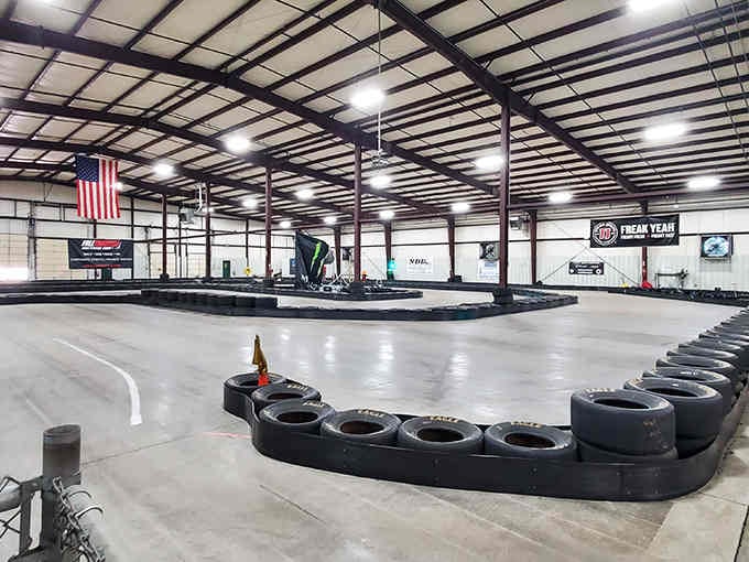 Indoor racing perfection with tire barriers lining every curve, keeping your adventure safe and your adrenaline pumping high.
