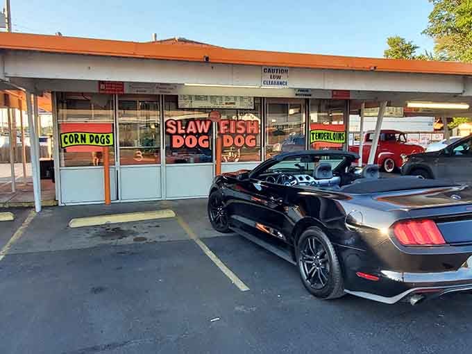 Those bright orange accents and classic drive-in windows practically shout "pull up and get ready for nostalgia!"