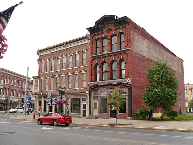 These weathered brick facades tell stories of industrial glory days while housing today's thriving local businesses and community gathering spots.