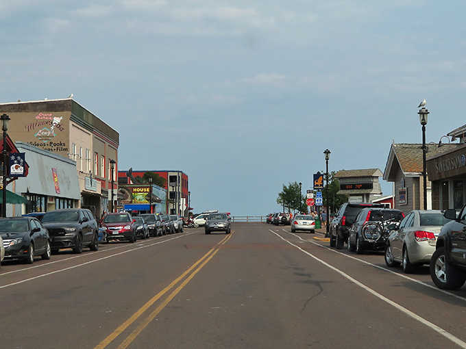 That road leads straight to Lake Superior's endless blue horizon, where the water meets sky in perfect harmony.