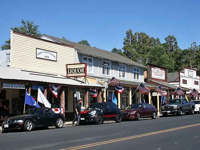 Patriotic bunting decorates storefronts in this mountain town where every day feels like a celebration of simpler times and community.