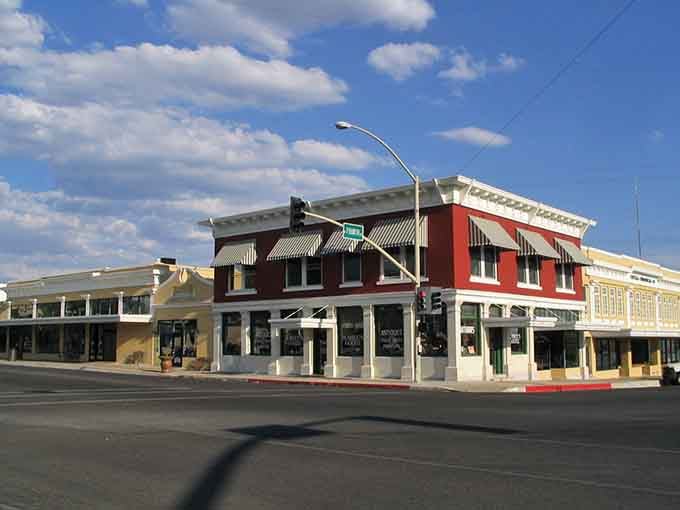 Corner buildings stand proud under blue skies, offering small-town charm without the big-city price tag attached.