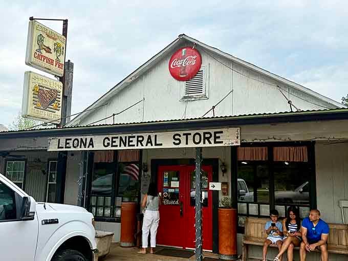 That vintage Coca-Cola sign and front porch practically beg you to sit a spell and stay awhile.
