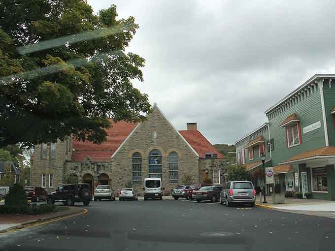 That stone building with the red roof could double as a European village hall in any movie.
