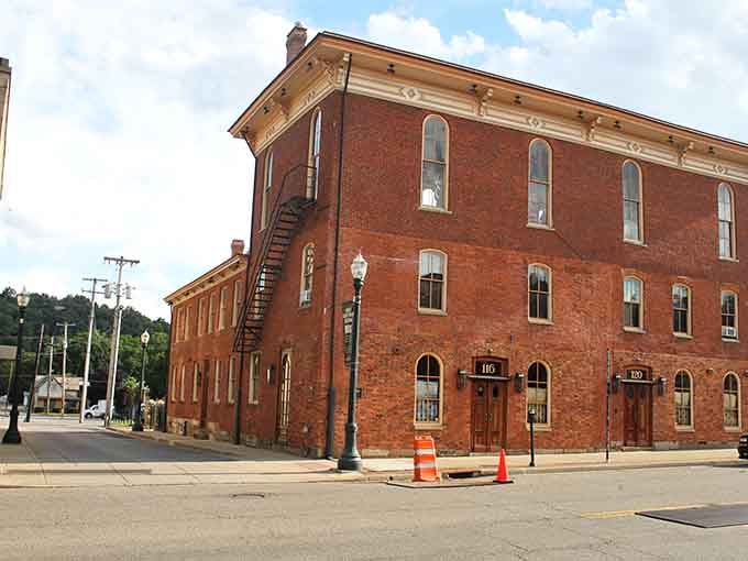 This brick corner building has the kind of solid, timeless architecture that makes modern construction look flimsy by comparison.