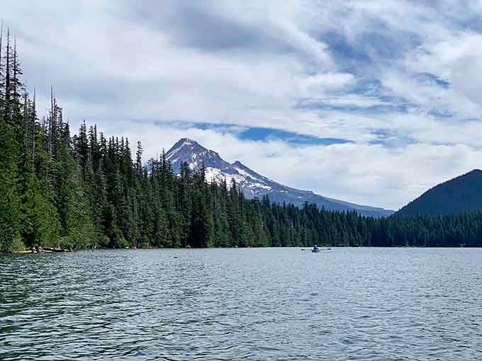 Mount Hood's reflection turns this alpine lake into nature's mirror, doubling your pleasure with every glance.
