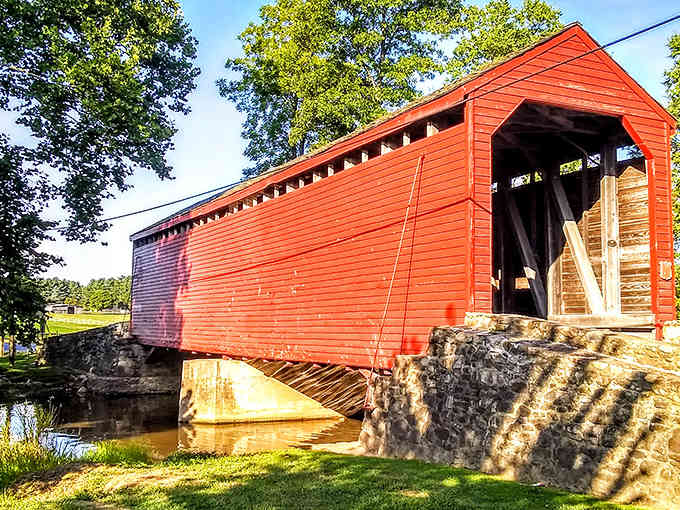 That brilliant red paint pops against blue skies, making this stone-foundation beauty shine brighter than a new penny.