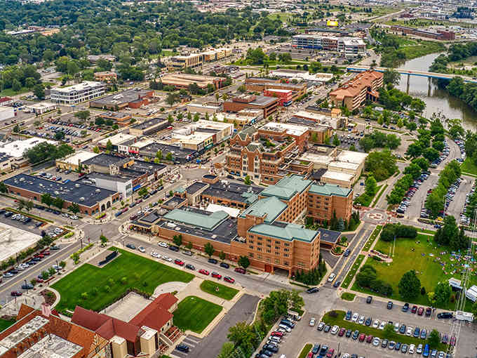 From above, this riverside community spreads out like a well-planned neighborhood where everything connects beautifully.