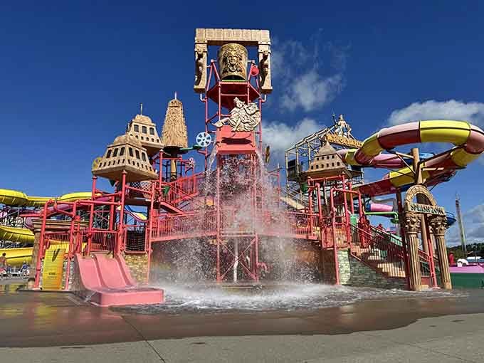 That giant bucket structure looks like something Zeus himself would approve of, ready to drench everyone below spectacularly.