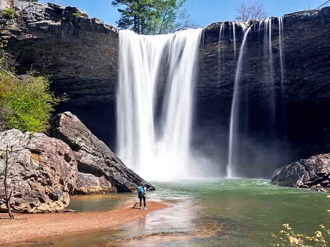 When 90 feet of waterfall meets a turquoise pool, you get the kind of view that makes postcards jealous.