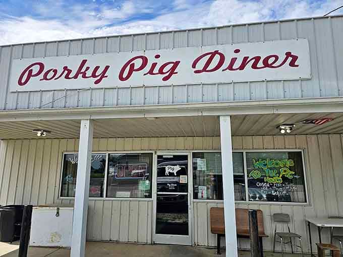 Classic script lettering announces hearty portions await inside this straightforward roadside gem that locals treasure.