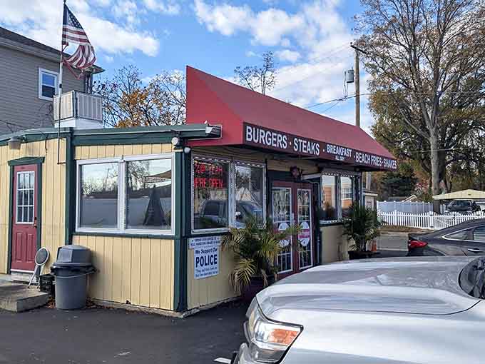 This cheerful roadside stand with its bright red canopy is proof that great hot dogs don't need fancy buildings.