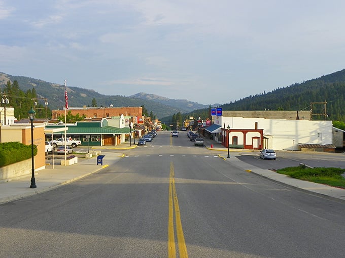 Wide open streets and mountain vistas create that classic frontier feeling where the sky seems bigger somehow.