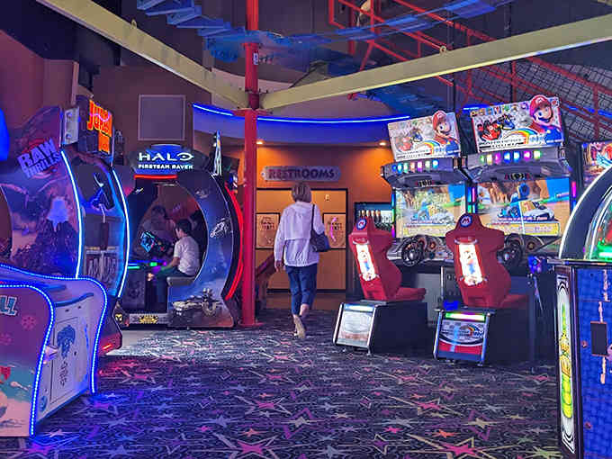 Step into this neon-lit arcade paradise where Pac-Man fever meets modern gaming - it's like Vegas for the under-21 crowd.