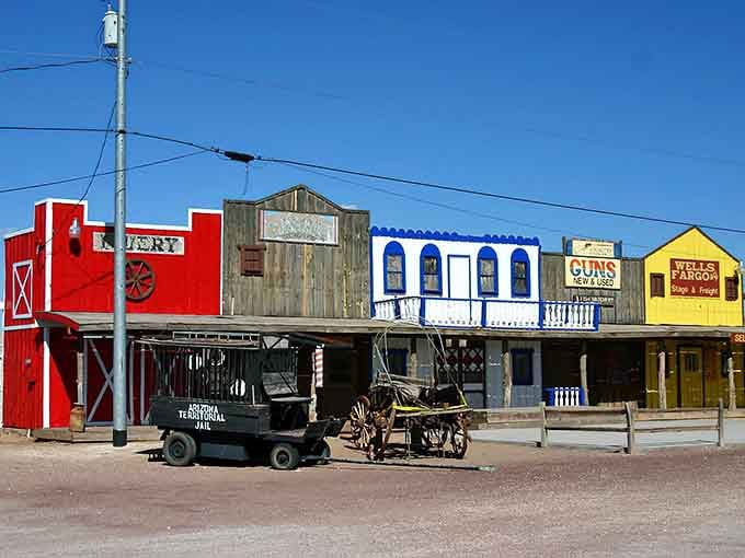Those colorful false-front buildings look like a movie set, but this Route 66 town is wonderfully real.