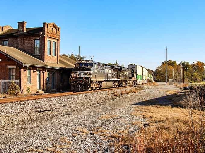 When a modern freight train rumbles past century-old brick buildings, you get the best of both railroad eras.