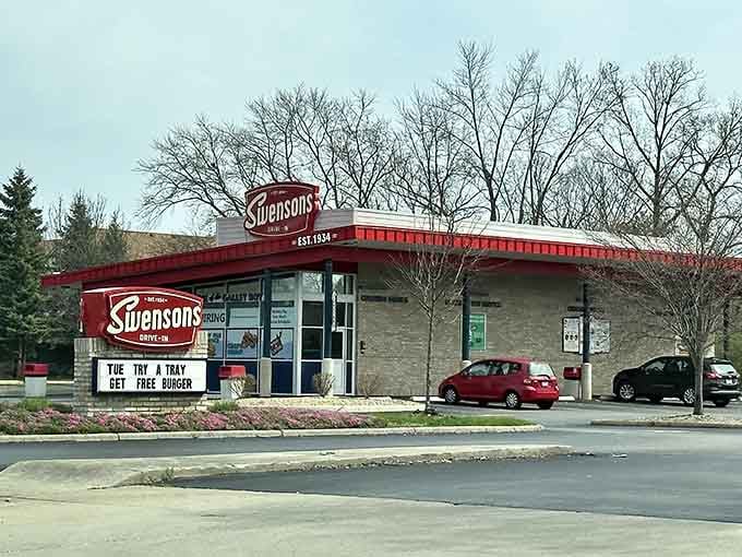 That retro sign and stone facade whisper "established 1934" louder than any billboard—authenticity you can taste before ordering.