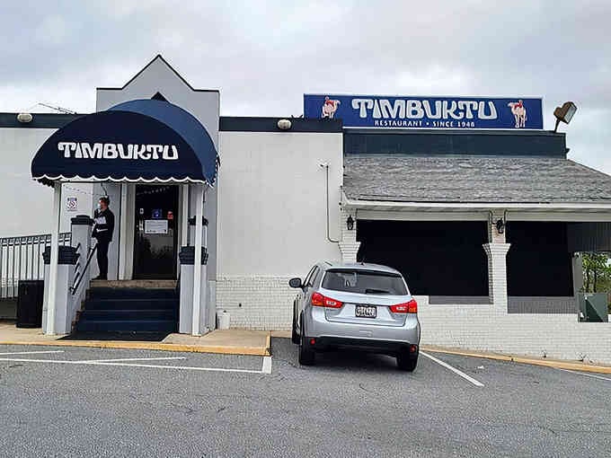 That classic awning and white facade signal serious crab cake territory—no pretense, just pure deliciousness waiting inside.