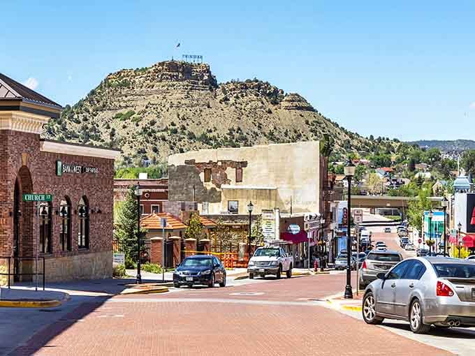 That rocky hill watches over downtown like a natural security guard who never takes a coffee break.