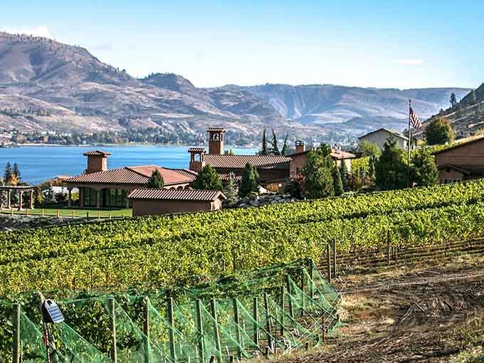 Tuscan dreams meet lakeside reality where Mediterranean architecture frames the sparkling blue waters of Lake Chelan perfectly.
