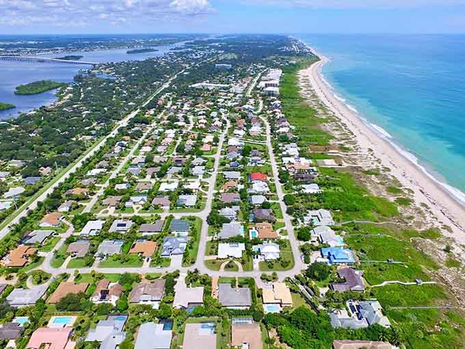 Where land meets endless Atlantic blue, this coastal community stretches along the shoreline like nature's perfect retirement postcard.