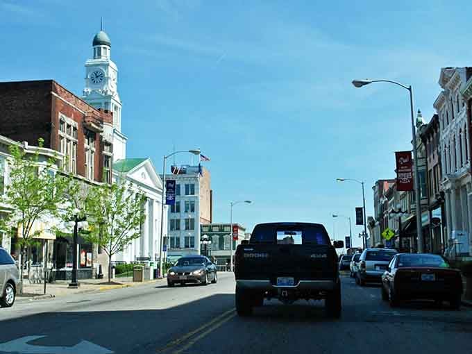 That clock tower stands tall like the town's timekeeper, watching over streets where everyone still knows their neighbors.