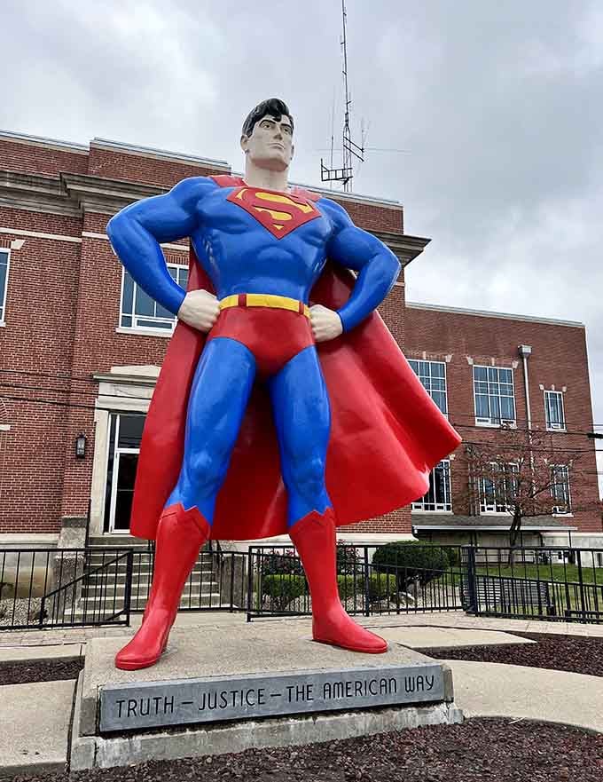 Standing fifteen feet tall, the Man of Steel strikes his iconic pose against the prairie sky.