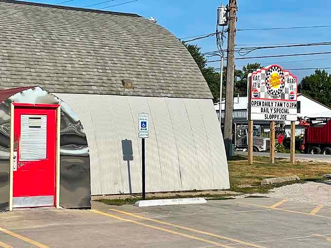 That curved metal building and bright red door invite you into a world where biscuits reign supreme.
