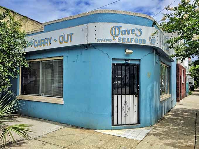 The curved architecture and weathered blue paint give this seafood spot character that fancy restaurants spend millions trying to fake.