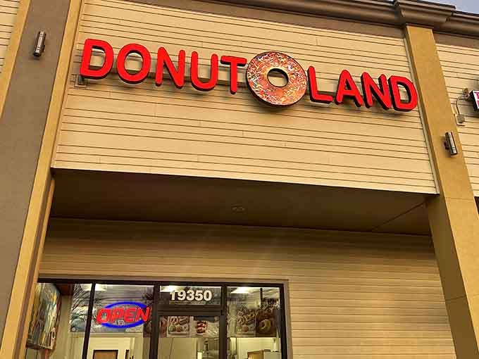 The bright red letters against pale siding make this spot impossible to miss, even from across the parking lot.
