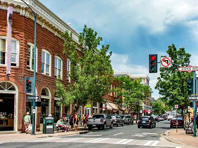 Tree-shaded sidewalks and red brick buildings create the perfect setting for an afternoon stroll and window shopping.