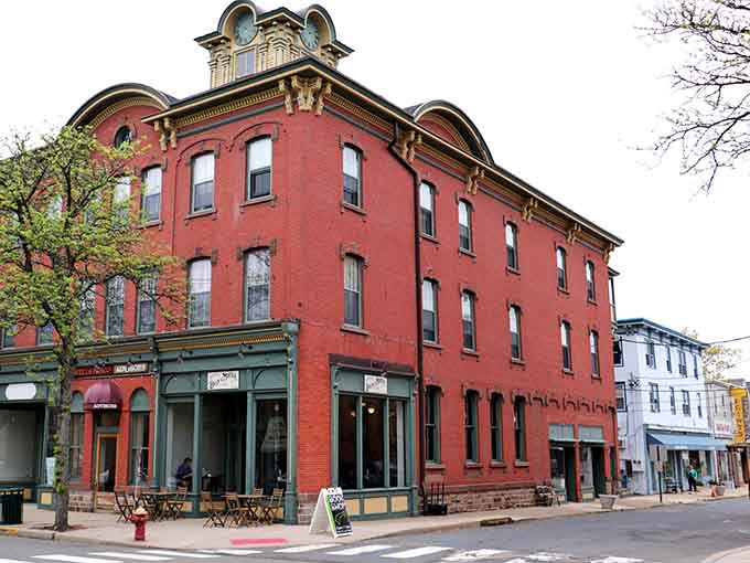 That ornate red brick building with the fancy crown molding has watched over Main Street for generations.