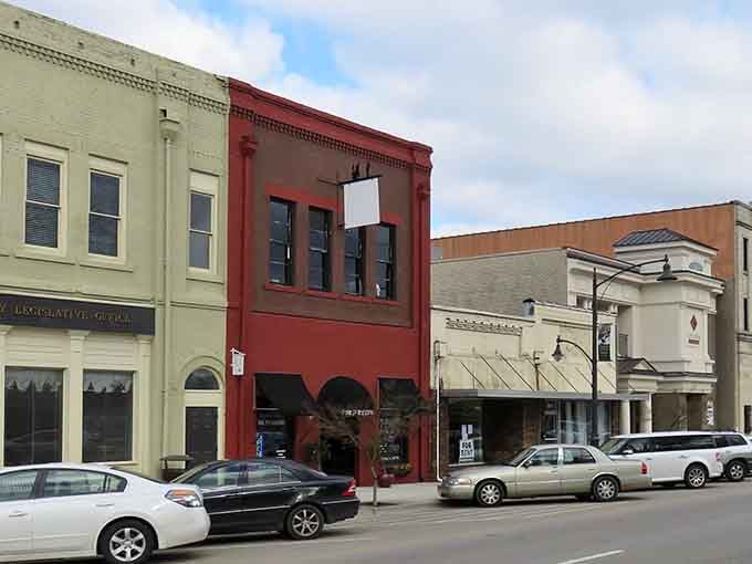 Painted buildings in cheerful hues line streets where neighbors still wave and visitors feel instantly welcome.