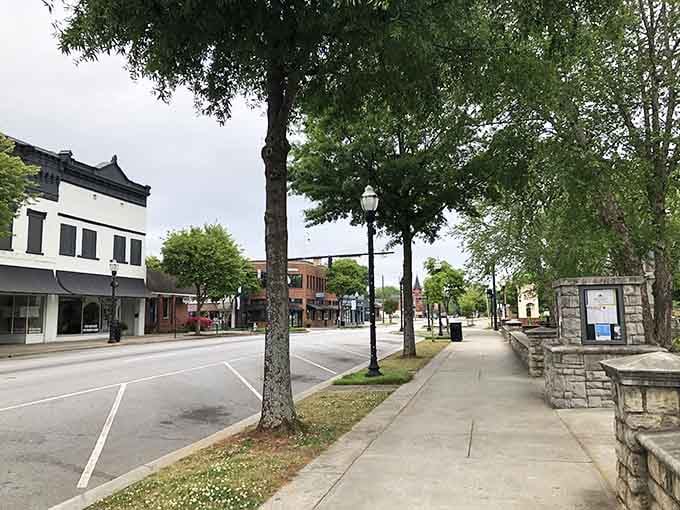 Wide sidewalks and classic street lamps invite you to slow down and actually enjoy the journey for once.