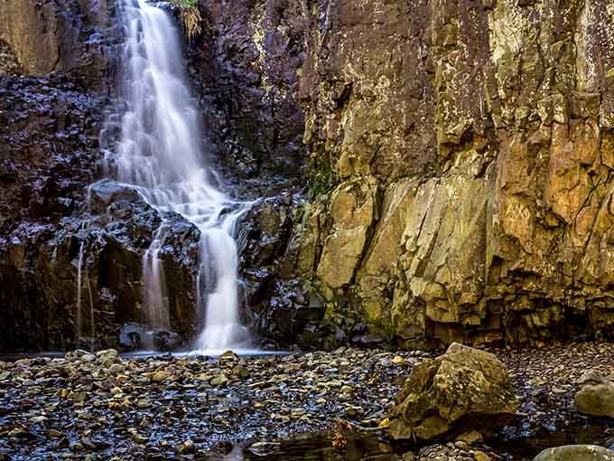 Ancient stone walls meet rushing water in a dance that's been going on longer than your favorite TV reruns.