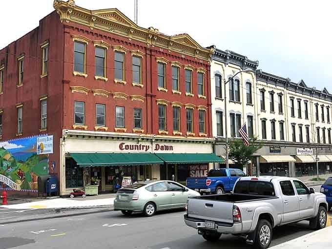 Historic storefronts showcase ornate details and varied architecture that prove small-town downtowns can be absolutely stunning when preserved with care.