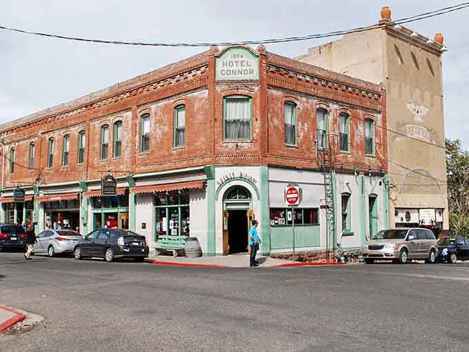 This corner building's weathered charm proves that some things only get better with age and desert sunshine.